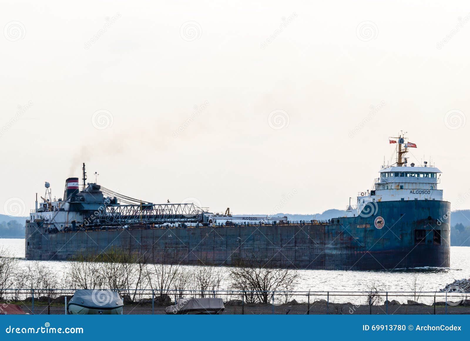 Great Lakes Bulk Freighter Leaves Harbor. Editorial Image - Image of ...