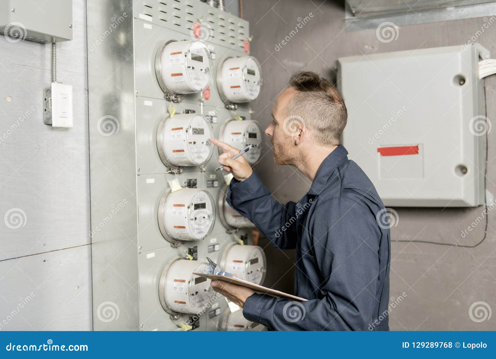 Man Technician Servicing at Work on Electric Room Stock Photo - Image ...