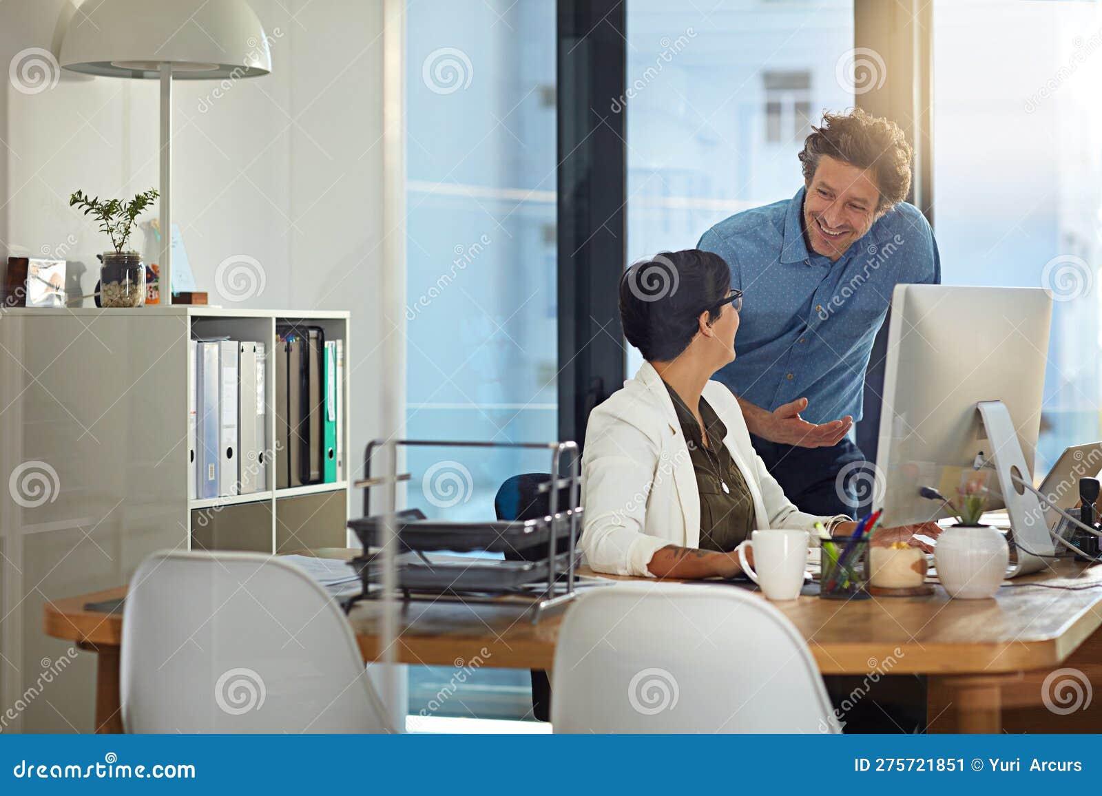 Great Minds at Work. Businesspeople Working on a Computer in an Office ...