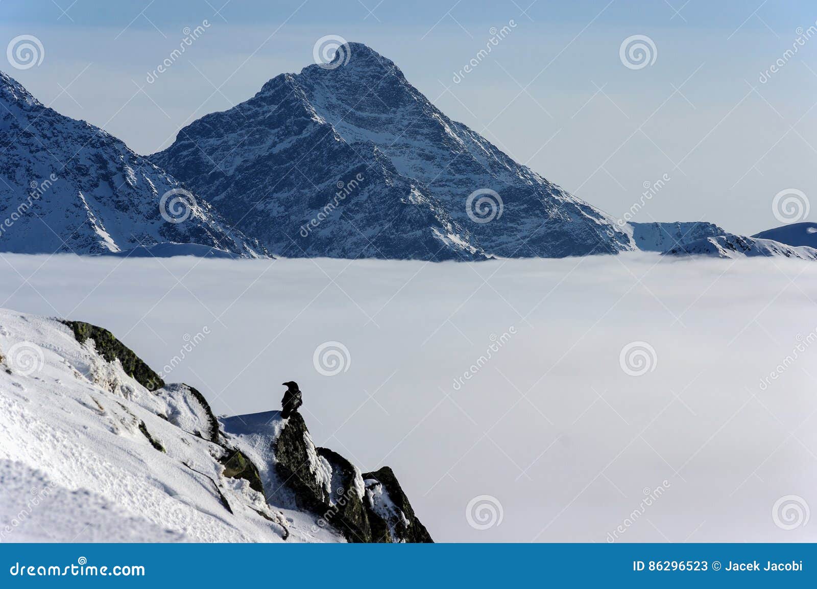 Great Mountain Peak in Winter Landscape. Inversion of Clouds Stock ...