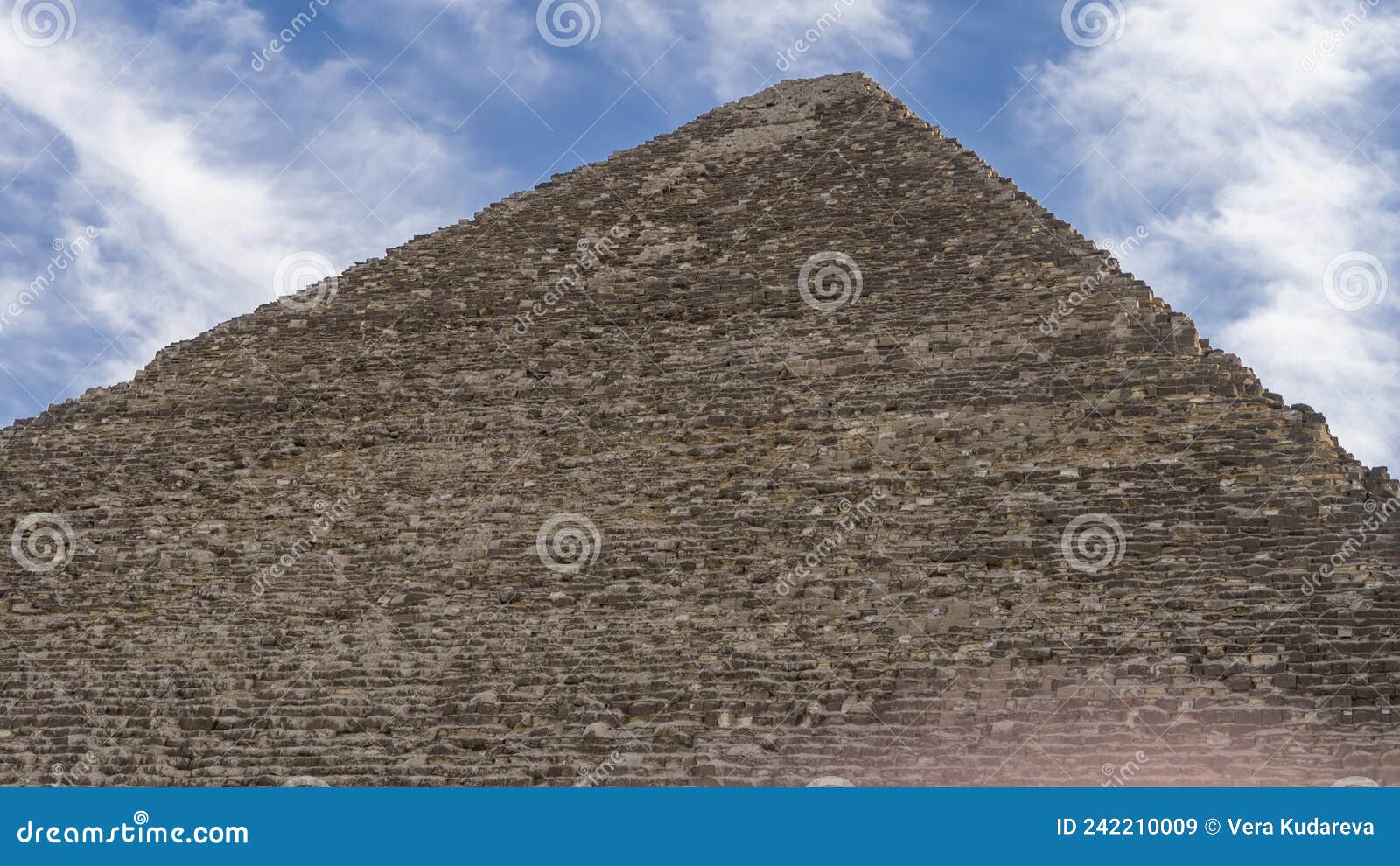 The Great Pyramid of Cheops on a Background of Blue Sky and Clouds ...