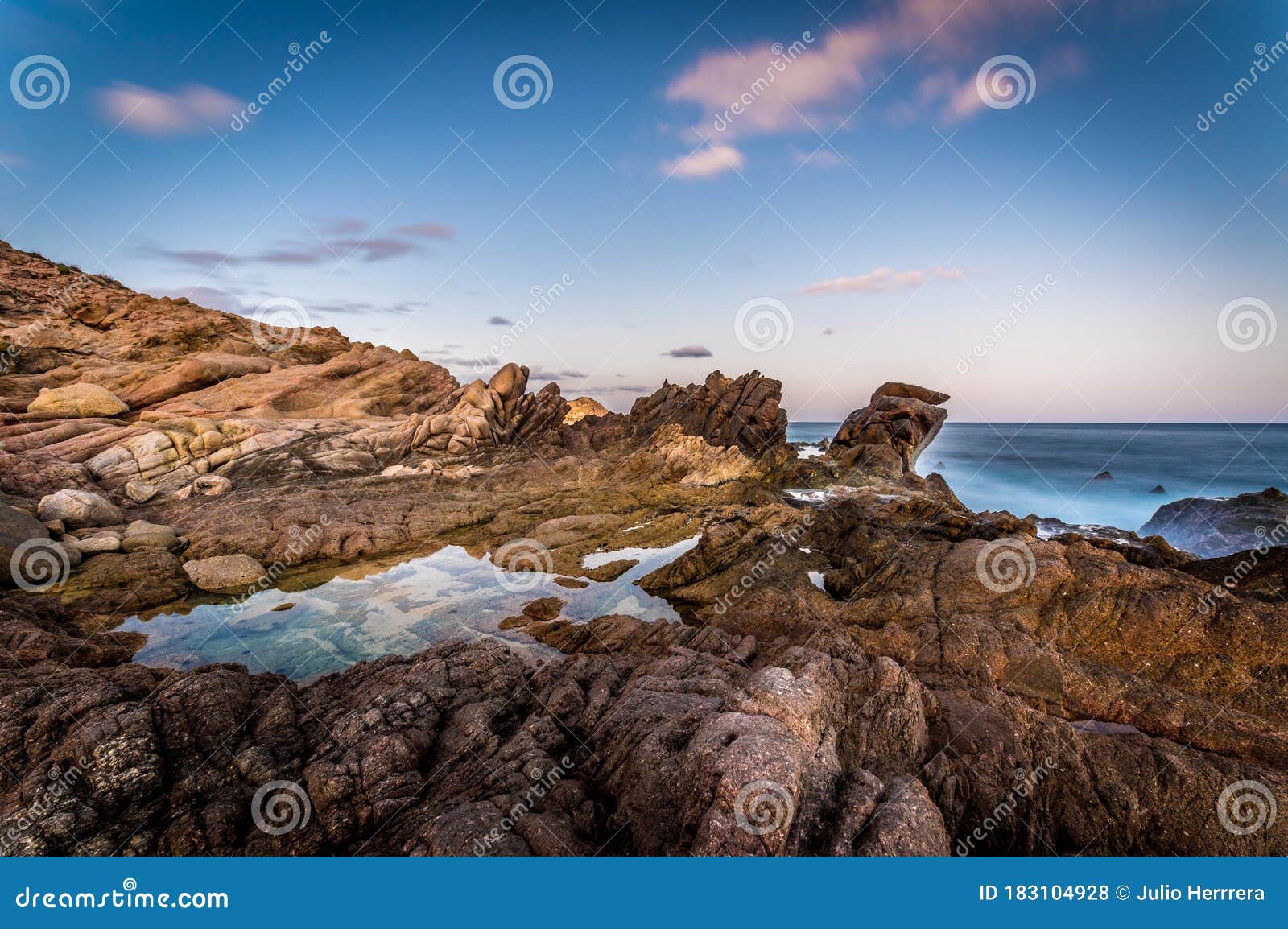 Rocks by the Sea Make Dramatic Scenery Stock Photo - Image of beautiful ...