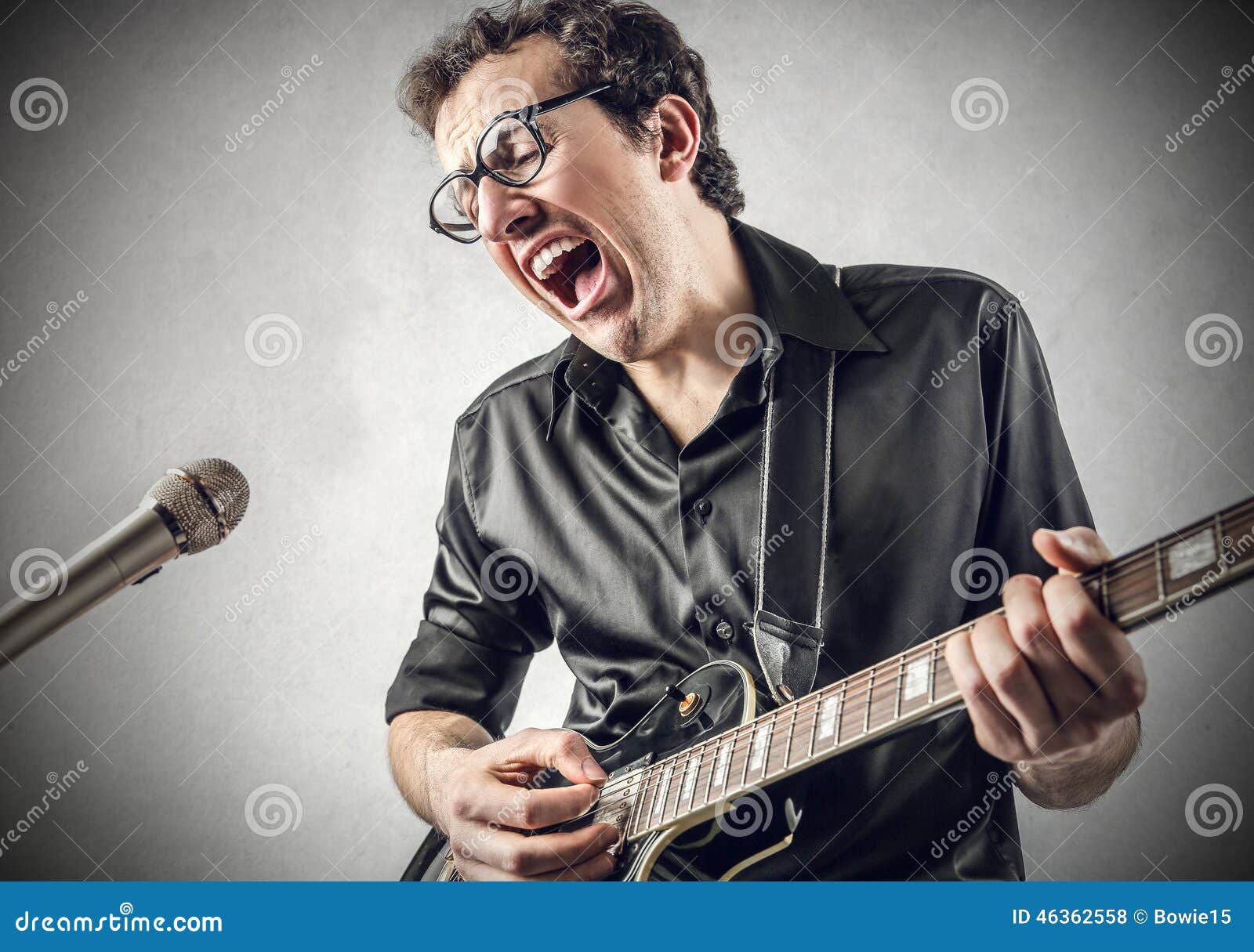 A Great Singer and Guitarist Stock Photo - Image of microphone, shout ...