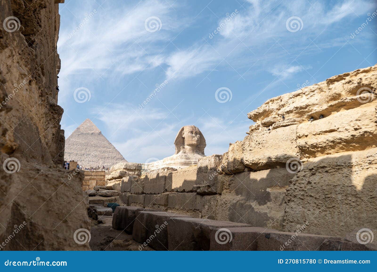 The Great Sphinx of Giza with the Great Pyramid Stock Photo - Image of ...