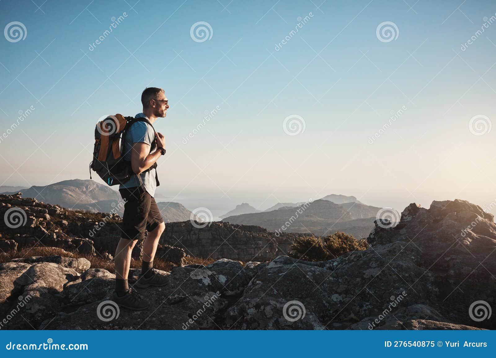 Great Things are Done with Determination. a Mature Man Hiking Up a ...