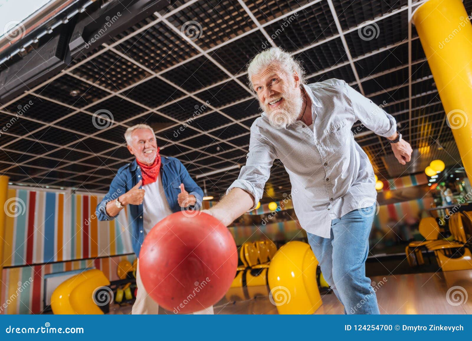 Cheerful Positive Man Smiling in Bowling at Day Stock Photo - Image of ... Cheerful Positive Man Smiling in Bowling at Day Stock Photo - Image of ...
