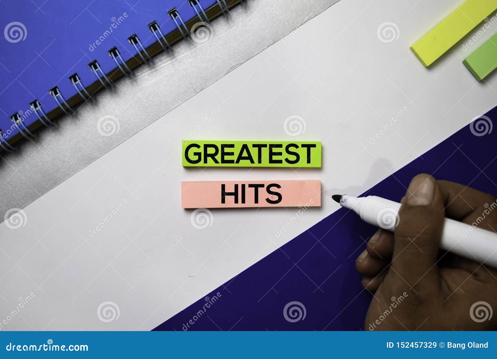 Greatest Hits Text on Sticky Notes with Color Office Desk Concept Stock ...