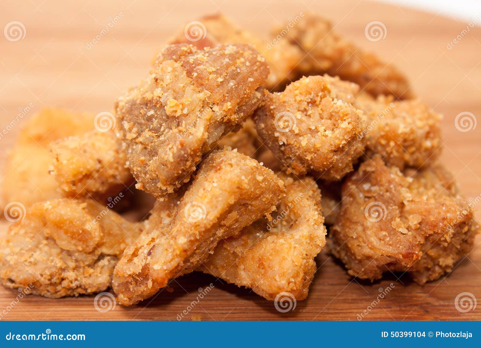 Greaves in a Pile on a Kitchen Wooden Board Stock Photo - Image of ...