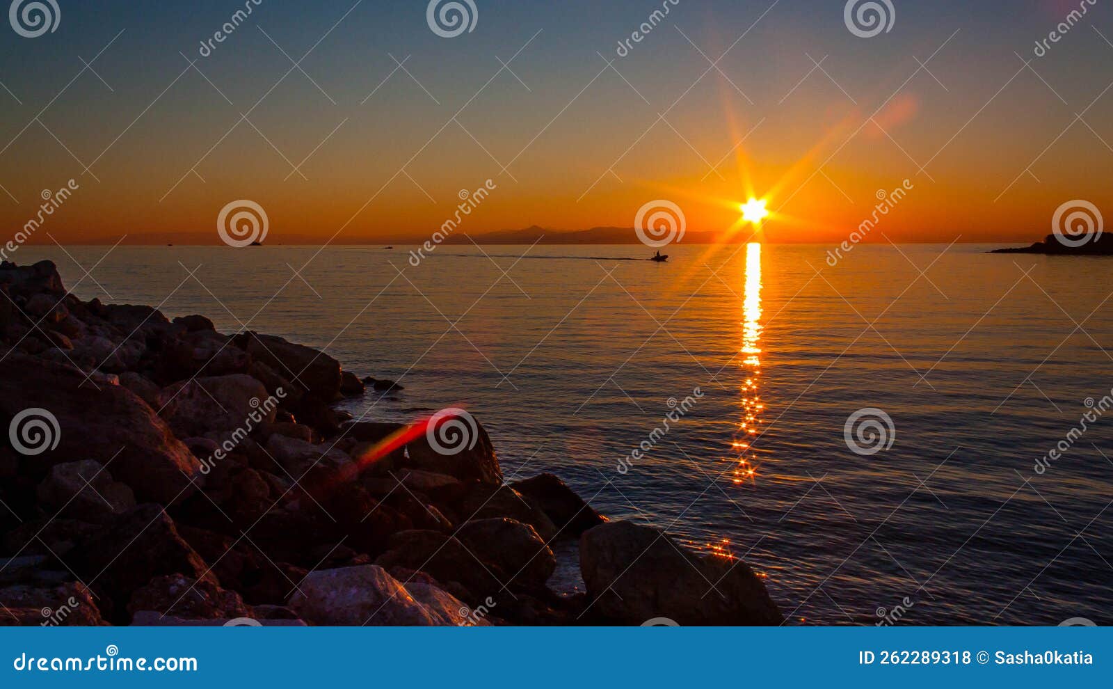 Sunset on the seashore. stock photo. Image of horizon - 262289318