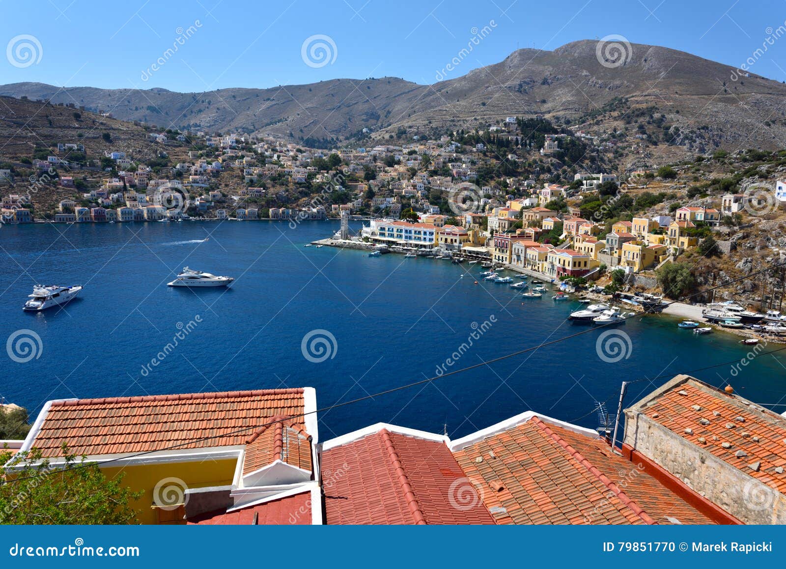 Greece, Symi Island stock photo. Image of tower, port - 79851770