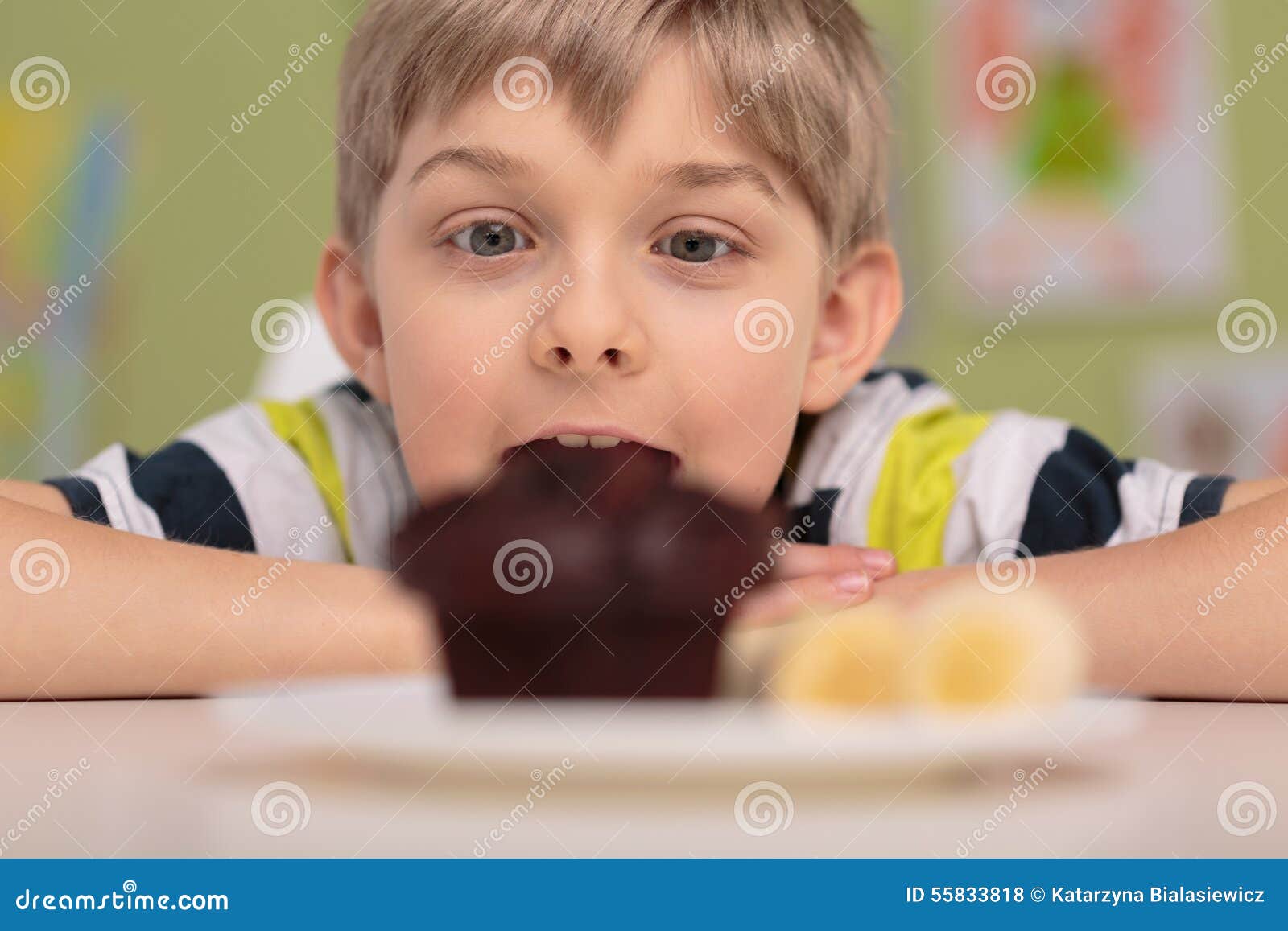 Greedy boy and muffin stock photo. Image of childhood - 55833818