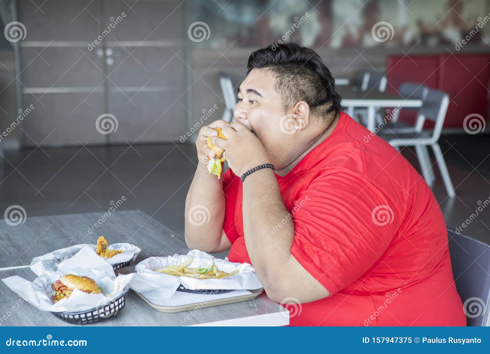 Greedy Obese Man Eating Fast Foods In Restaurant Stock Image Image Of