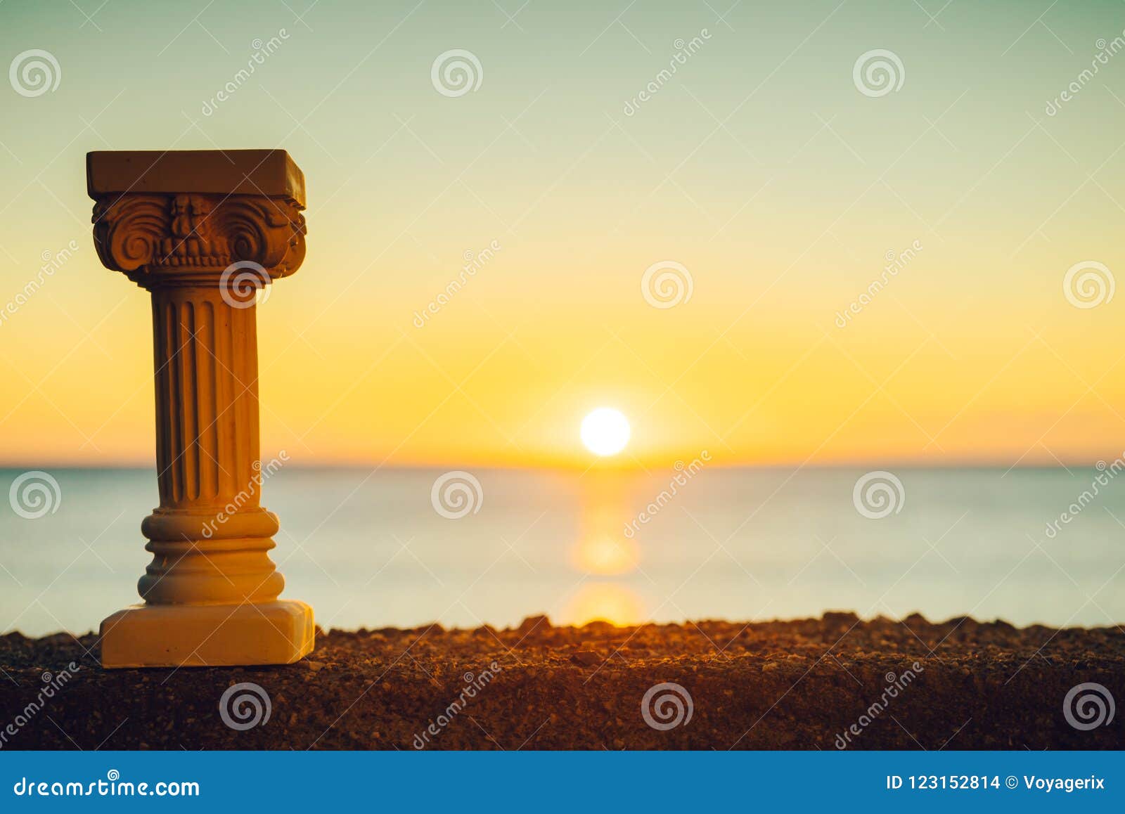 Greek Column on Shore and Sunset Over Sea Surface Stock Photo - Image ...