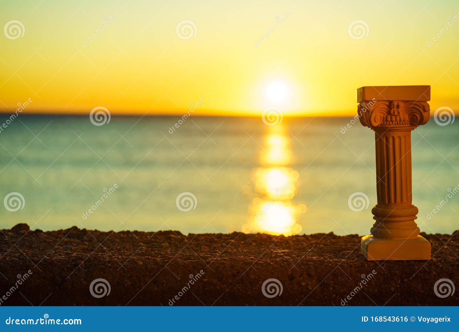 Greek Column on Shore and Sunset Over Sea Surface Stock Photo - Image ...