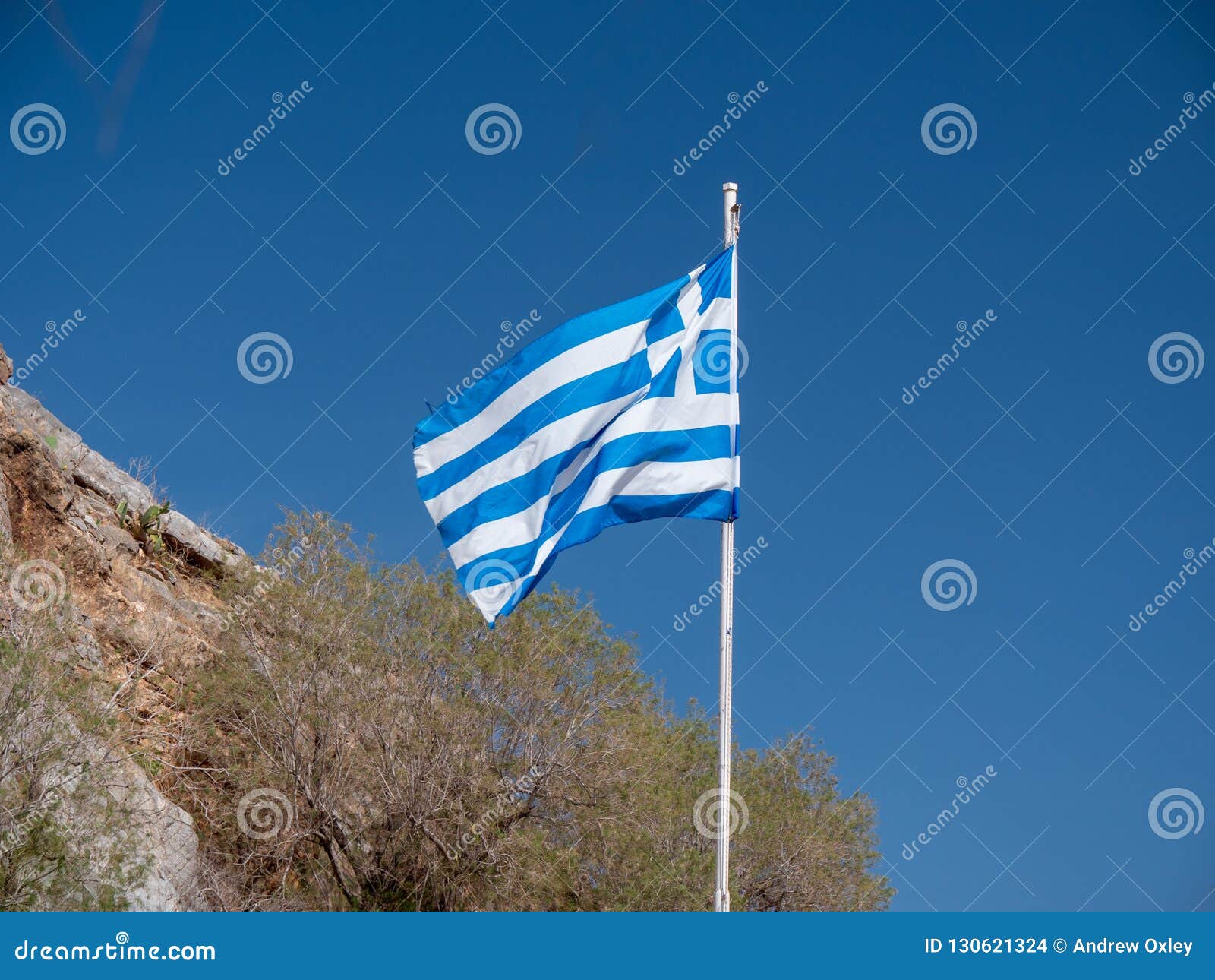 Greek flag flying on Crete stock photo. Image of proud - 130621324