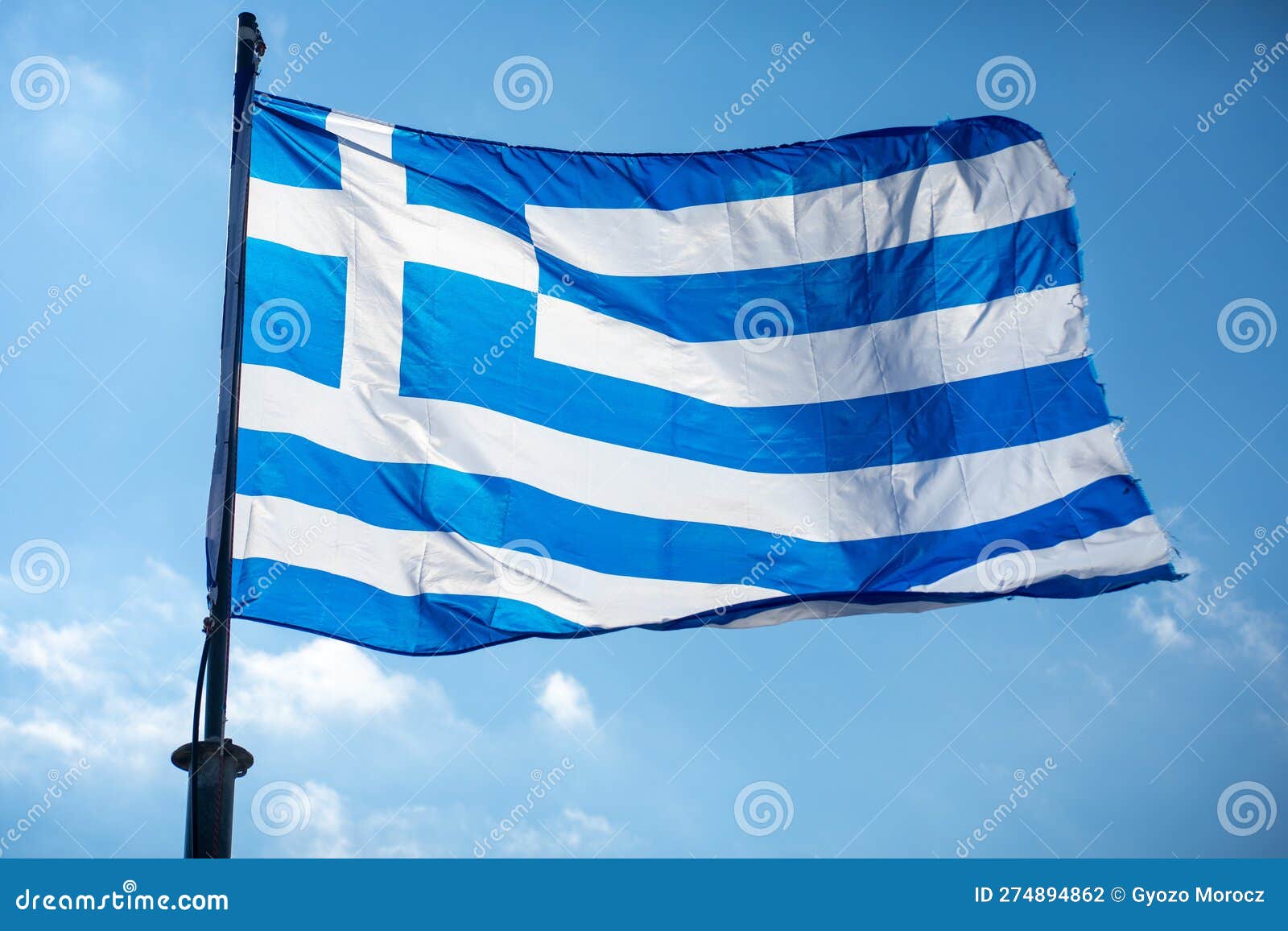 Greek flag in the wind stock photo. Image of blue, cross - 274894862