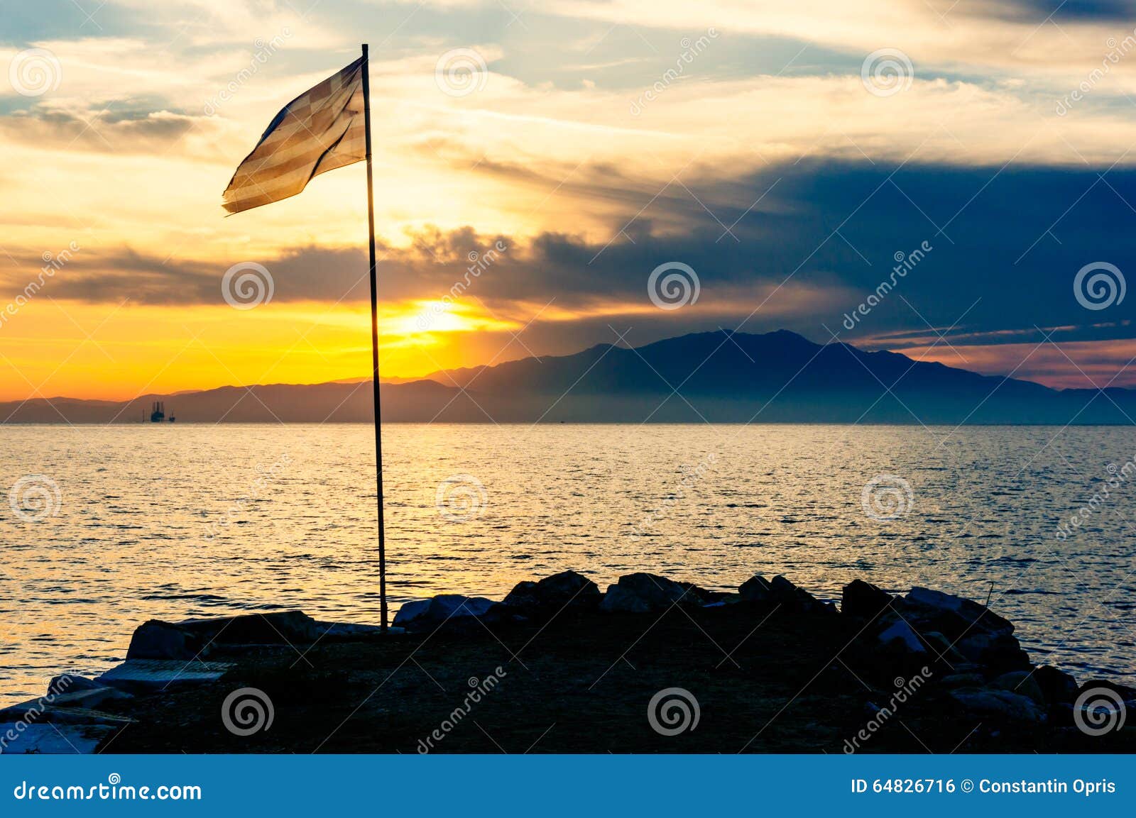 Greek Flag, Seashore, Sunset Stock Photo - Image of greece, waters ...
