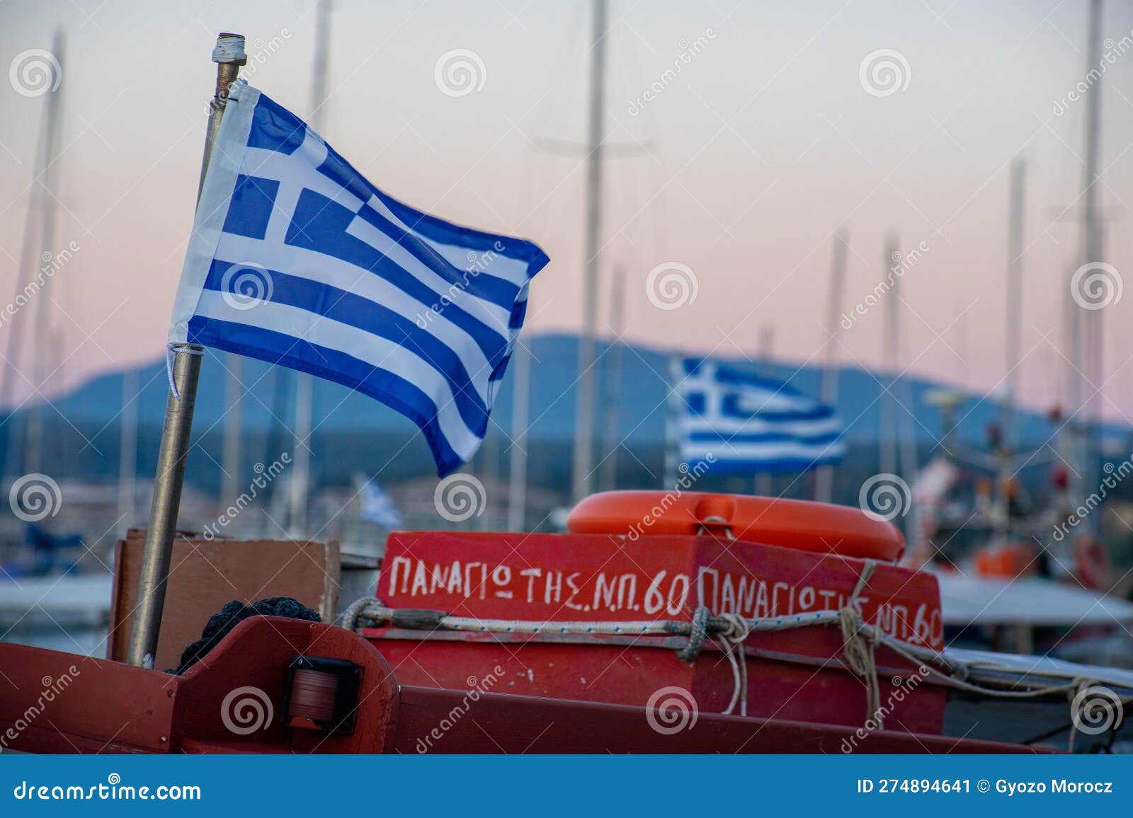 Greek flag to boat stock image. Image of greek, brand - 274894641