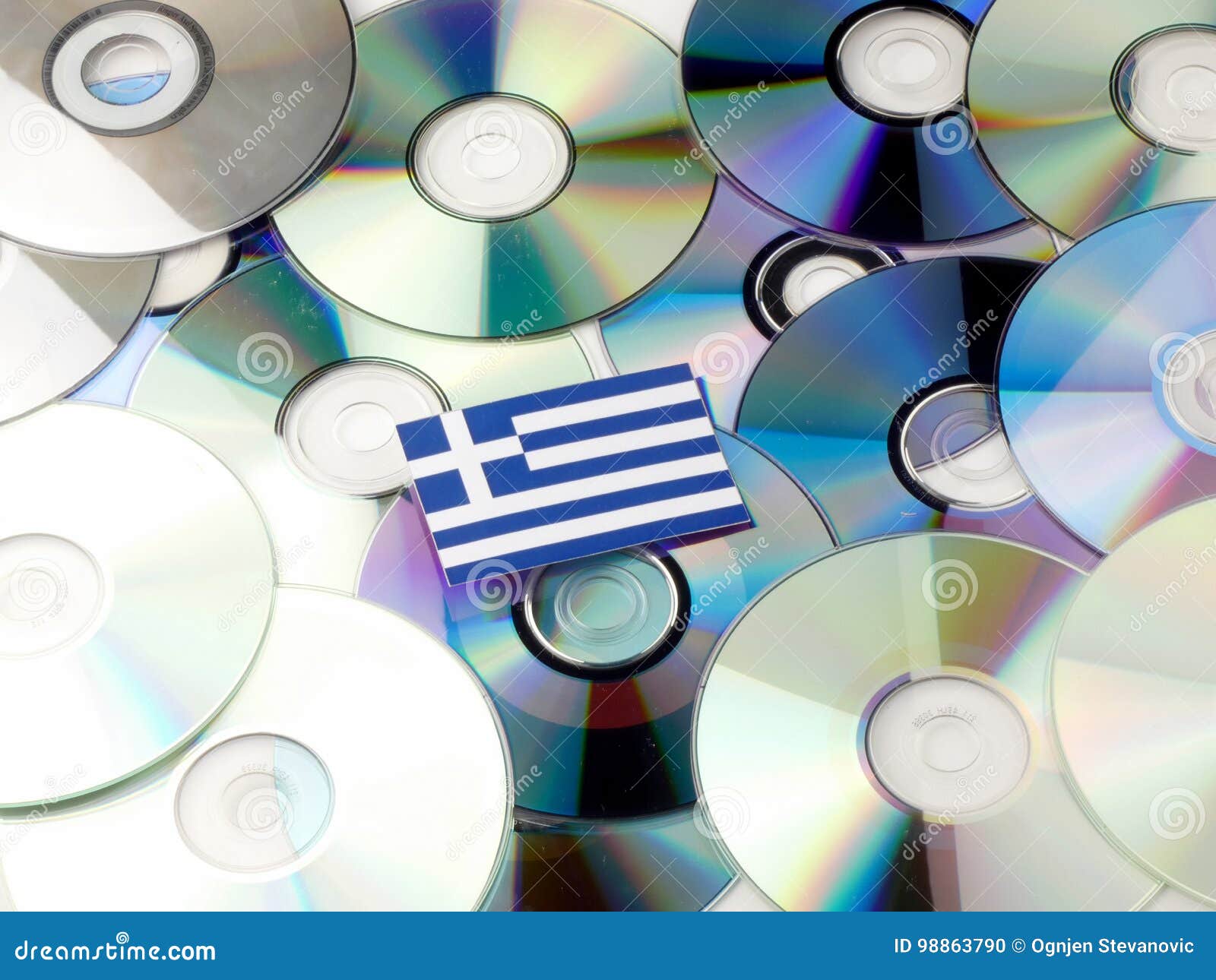 Greek Flag on Top of CD and DVD Pile Isolated on White Stock Photo ...