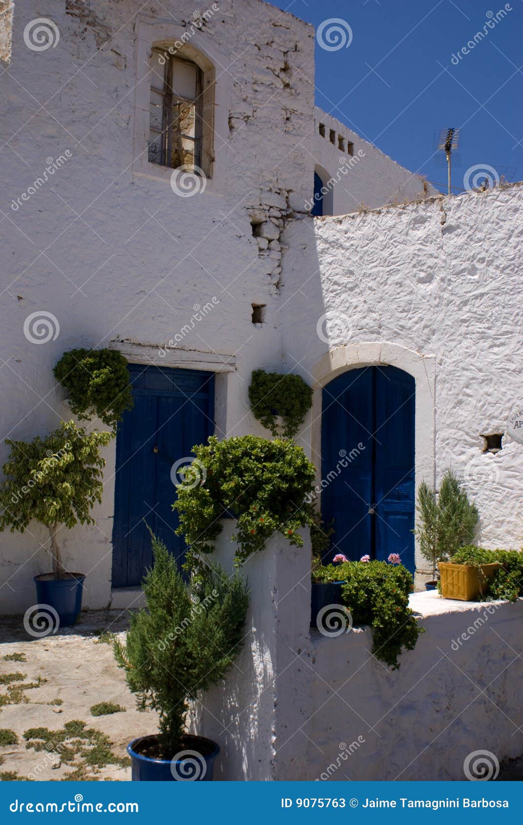 Greek front courtyard stock image. Image of street, back - 9075763