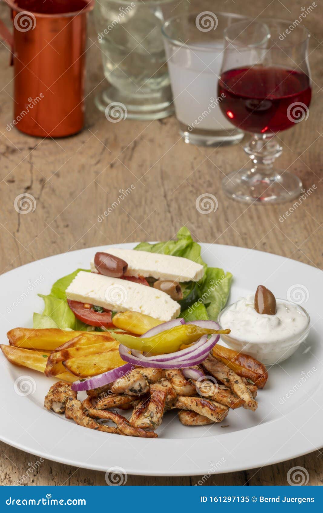 Greek gyros on a plate stock image. Image of doner, glass - 161297135