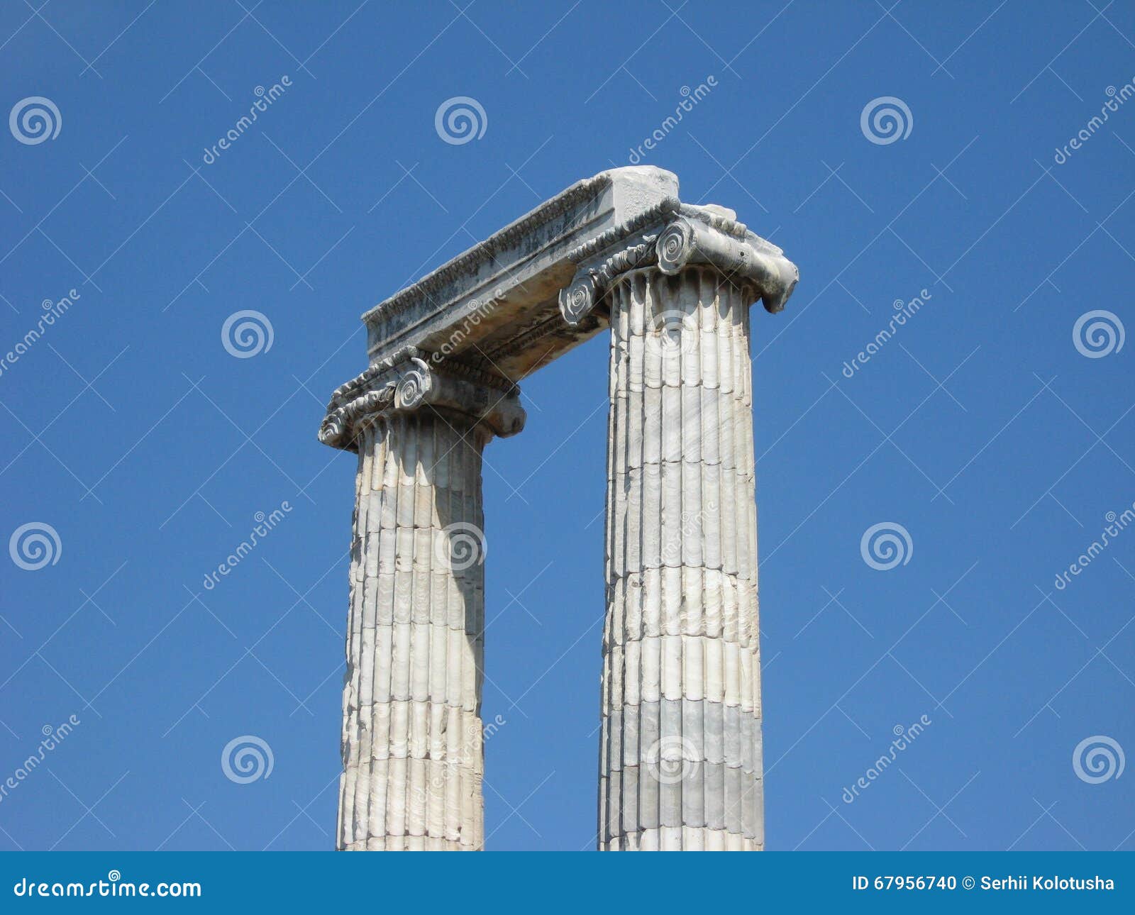 Greek Ionic Columns and Blue Sky Stock Photo - Image of apollo ...