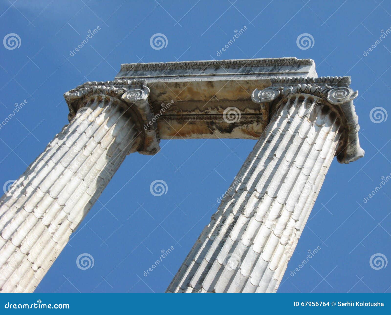 Greek Ionic Columns and Blue Sky Stock Photo - Image of backgrounds ...