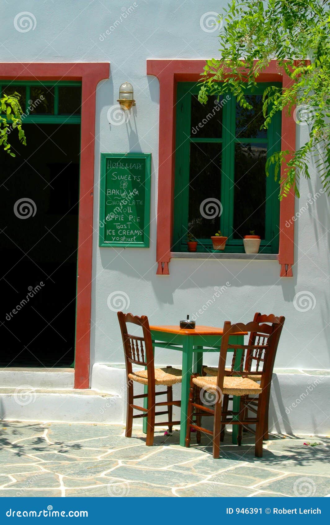 Greek island cafe stock image. Image of tourism, food, chairs - 946391