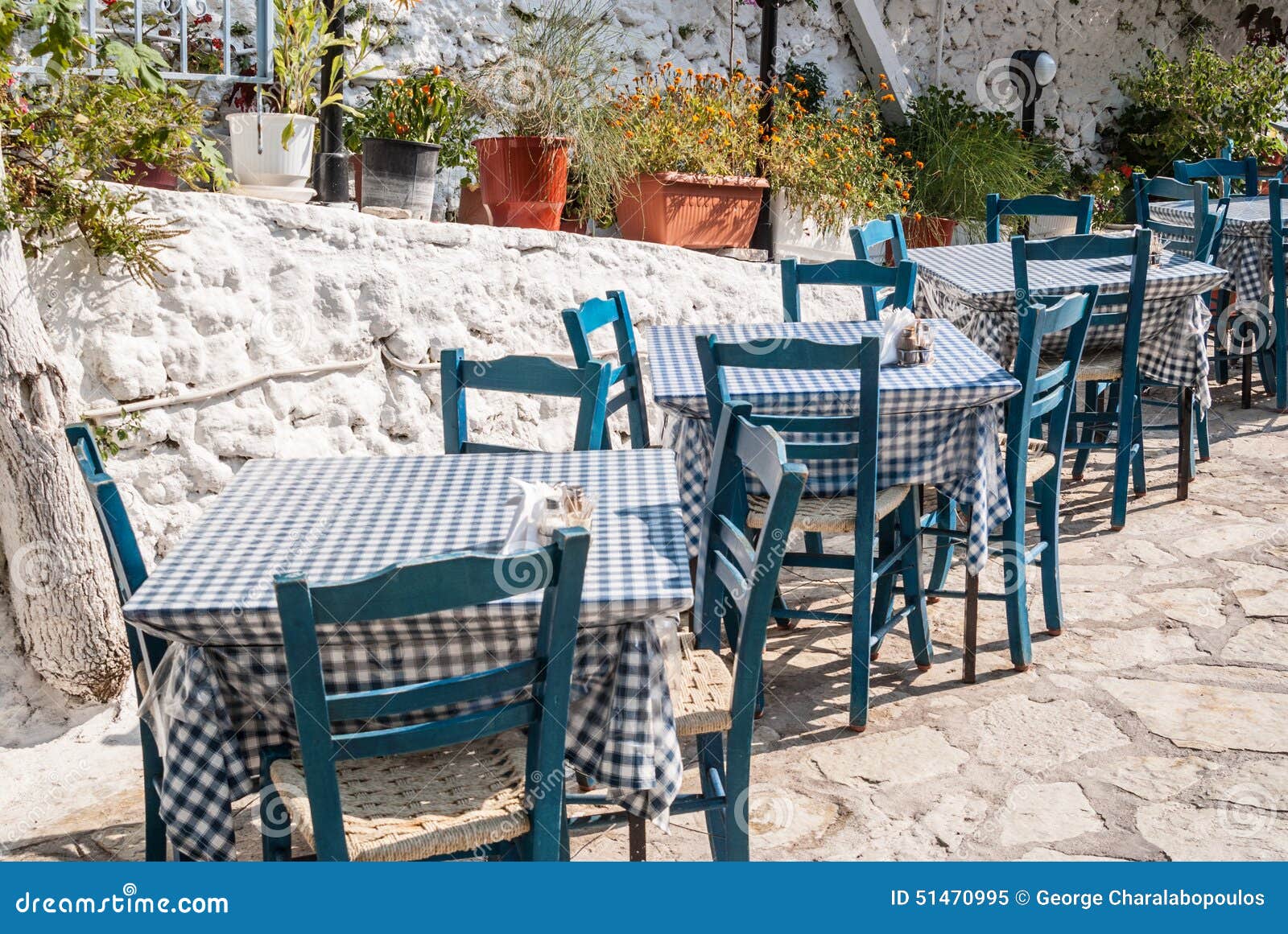 Greek island dining tables stock image. Image of greece - 51470995