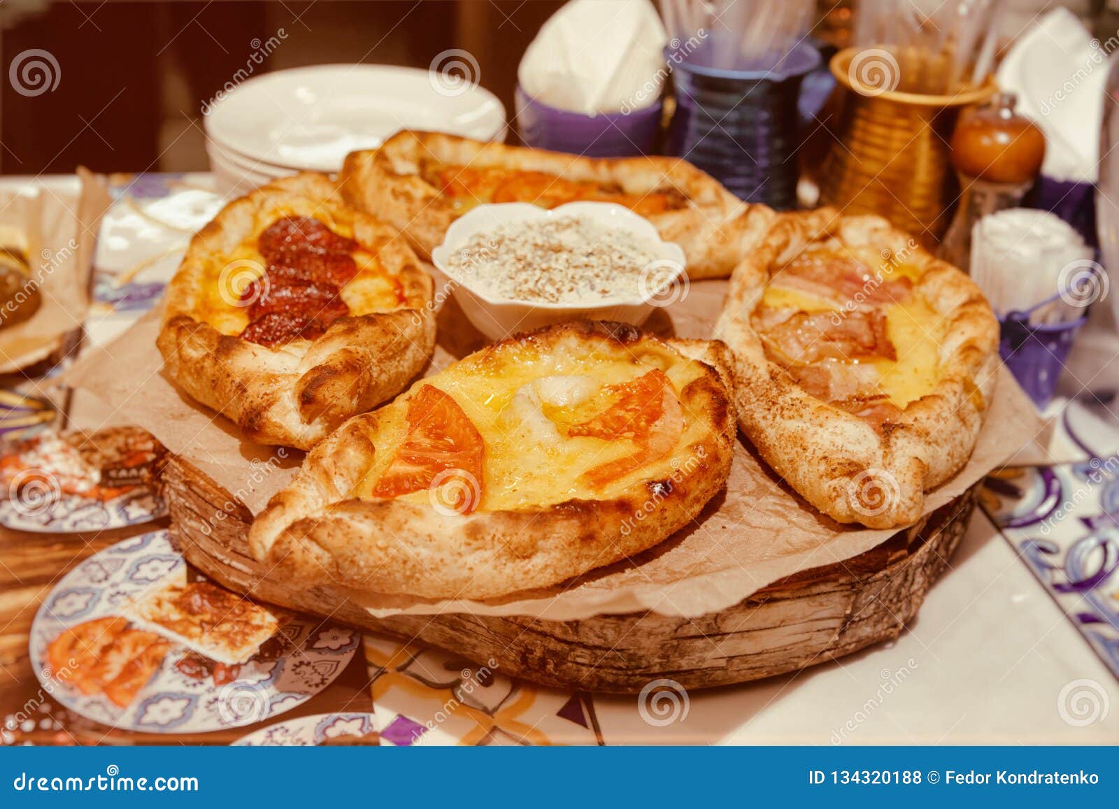Greek Pide Pastry on Restaurant Table, Toned Stock Photo - Image of ...