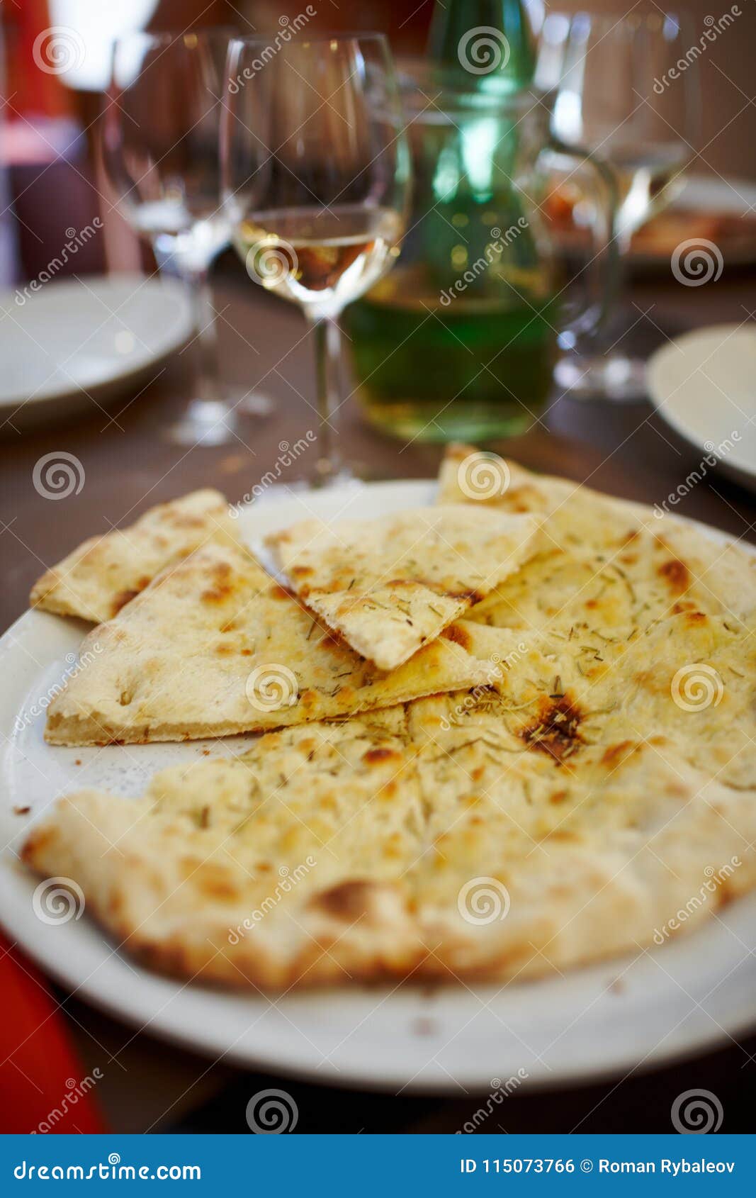 Greek pita on a plate stock photo. Image of lettuce - 115073766