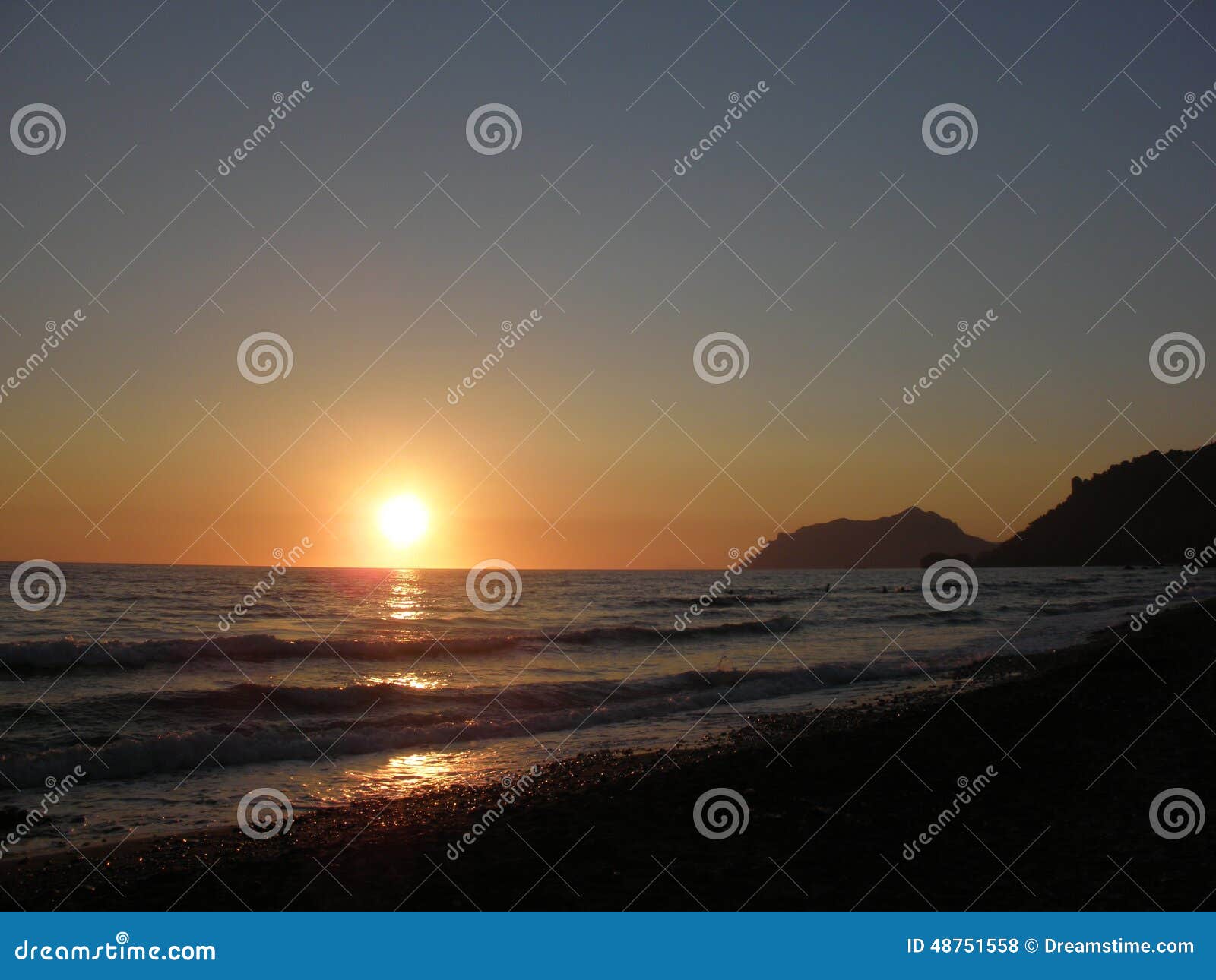 Greek sunset stock photo. Image of pebble, light, mountains - 48751558