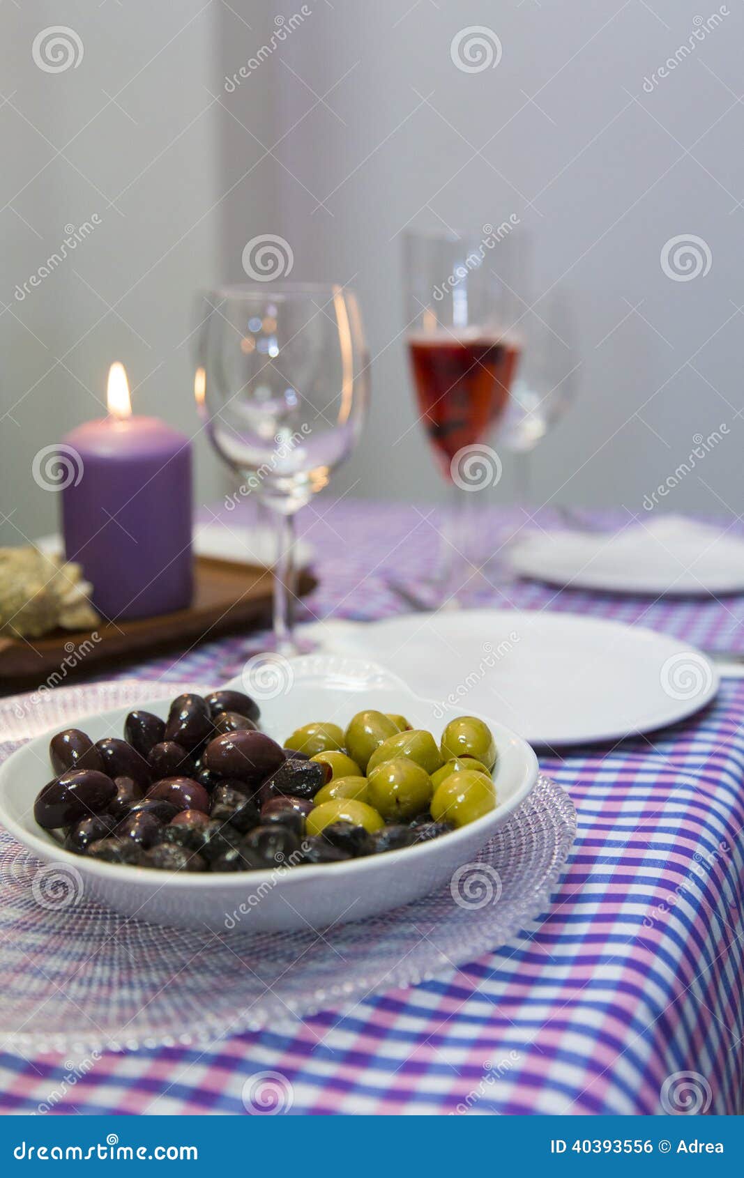 Greek Style Table Arrangement with a Plate Filled with Different Types ...