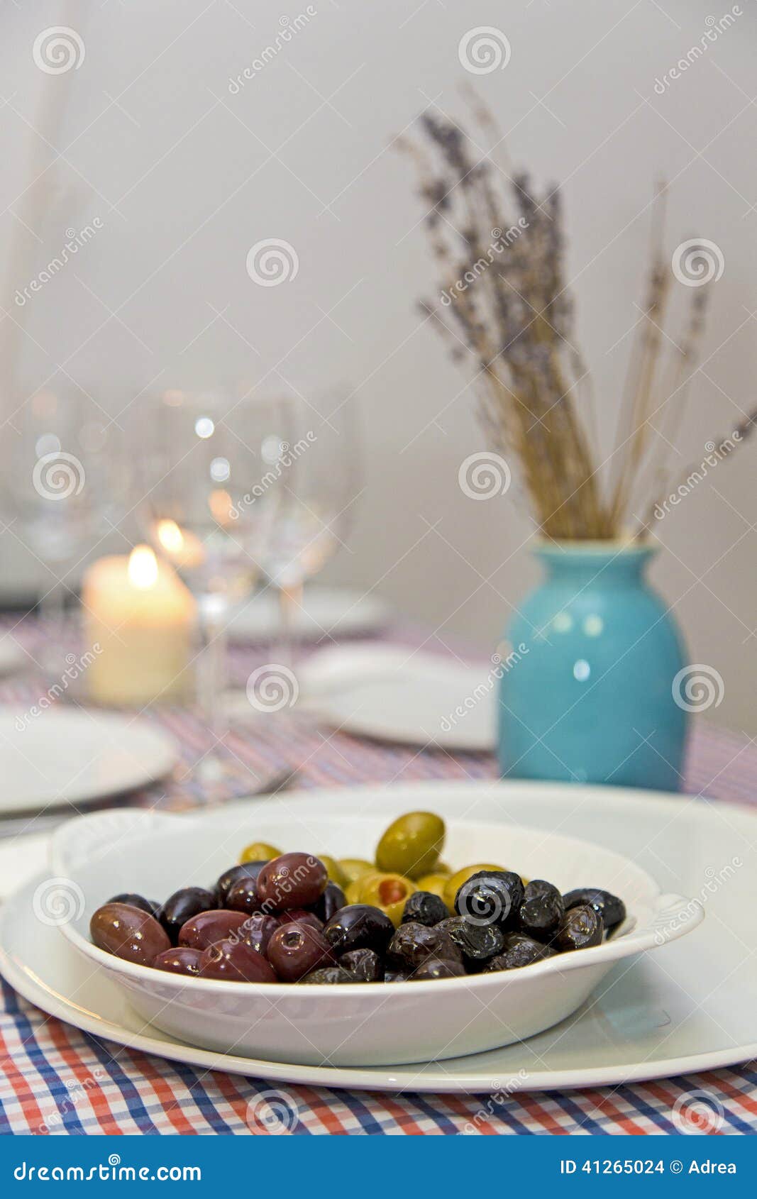 Greek Style Table Arrangement with a Plate Filled with Different Types ...