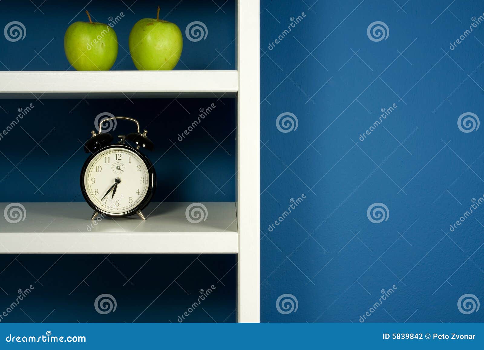 Green Apple and Clock Inside White Bookcase Stock Photo - Image of ...