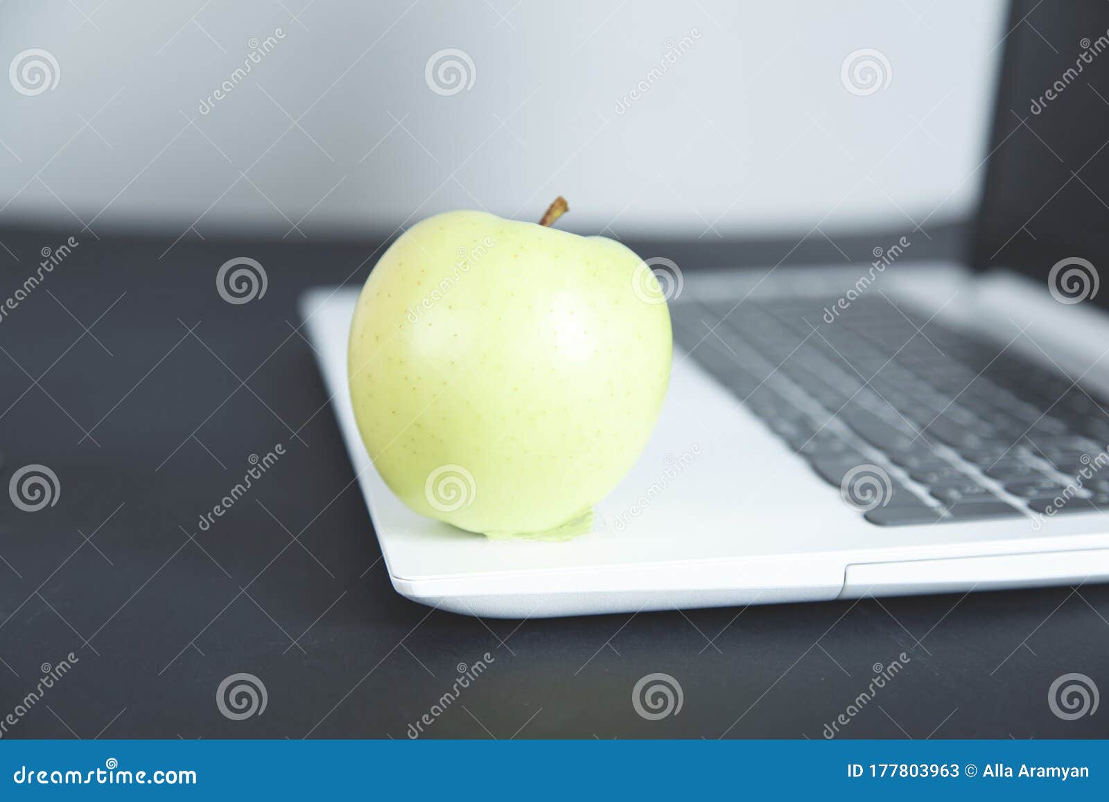 Green Apple on the Computer Stock Image - Image of office, eating ...