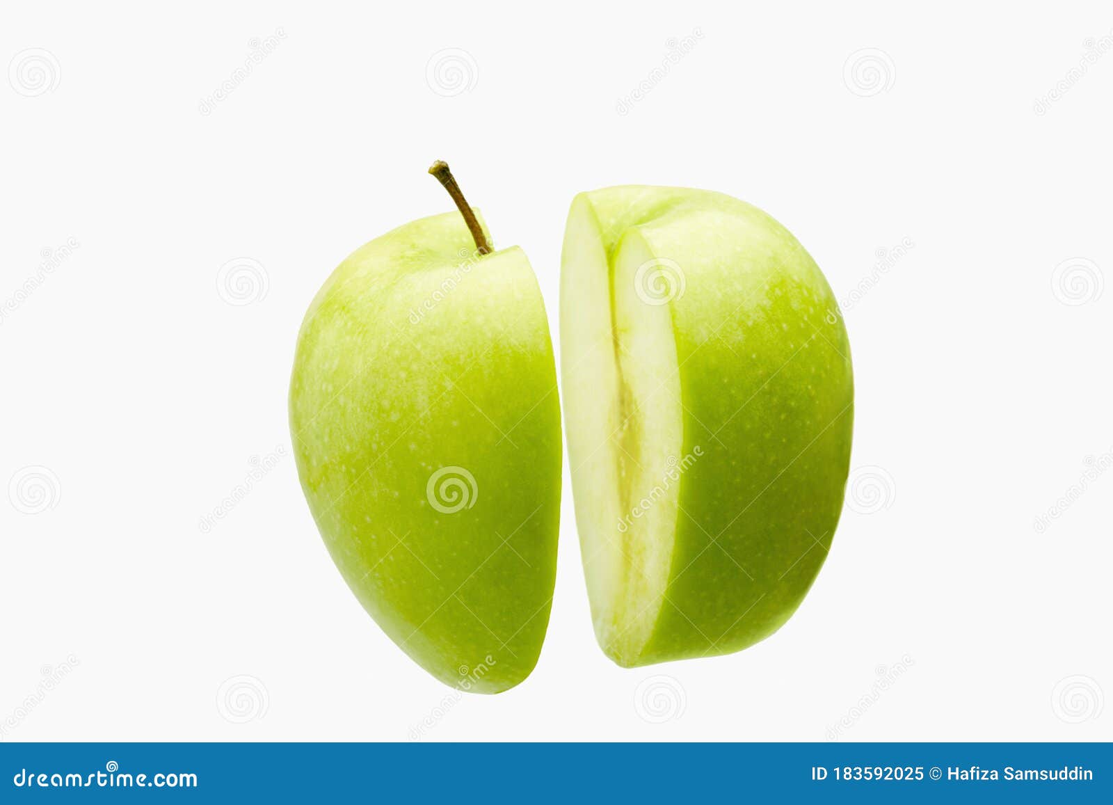Green apple cut in half stock image. Image of drink - 183592025