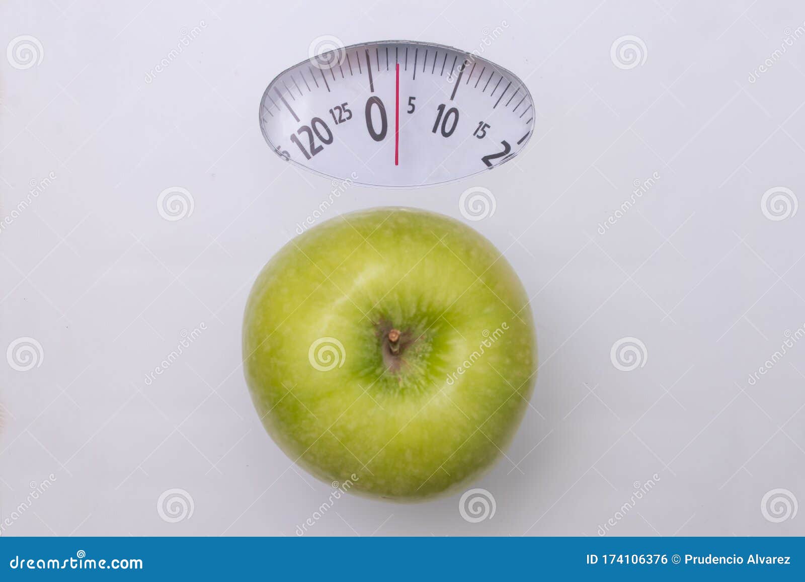 Green apple on scale stock photo. Image of scale, concept - 174106376