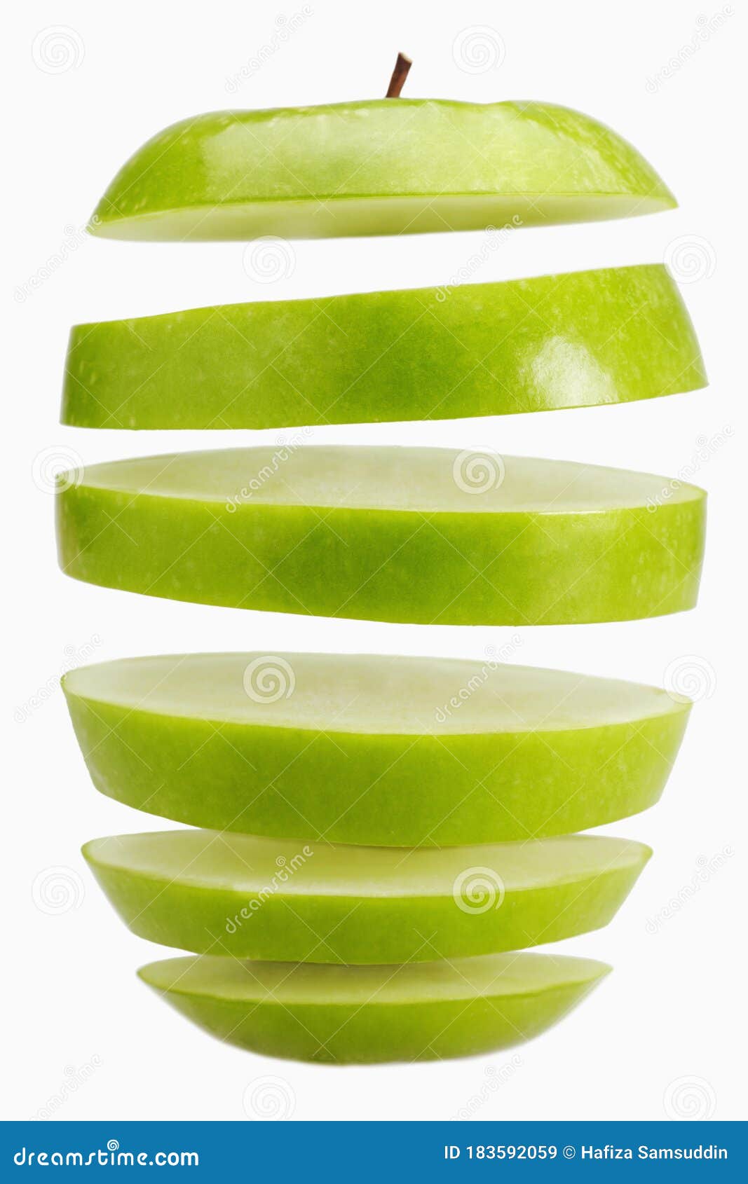 Green apple slices stock image. Image of fruit, medium - 183592059