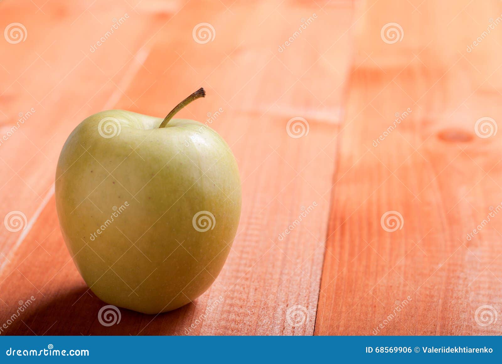 Green apple on the table stock photo. Image of food, grass - 68569906