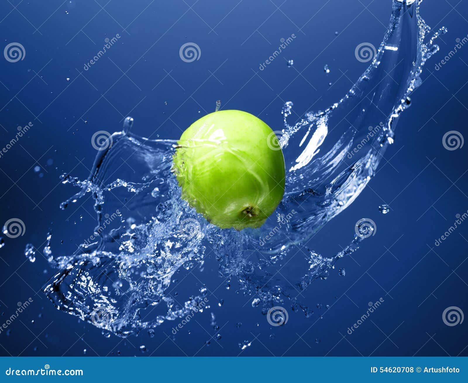 Green Apple with Water Splash, on Blue Water Stock Photo - Image of ...