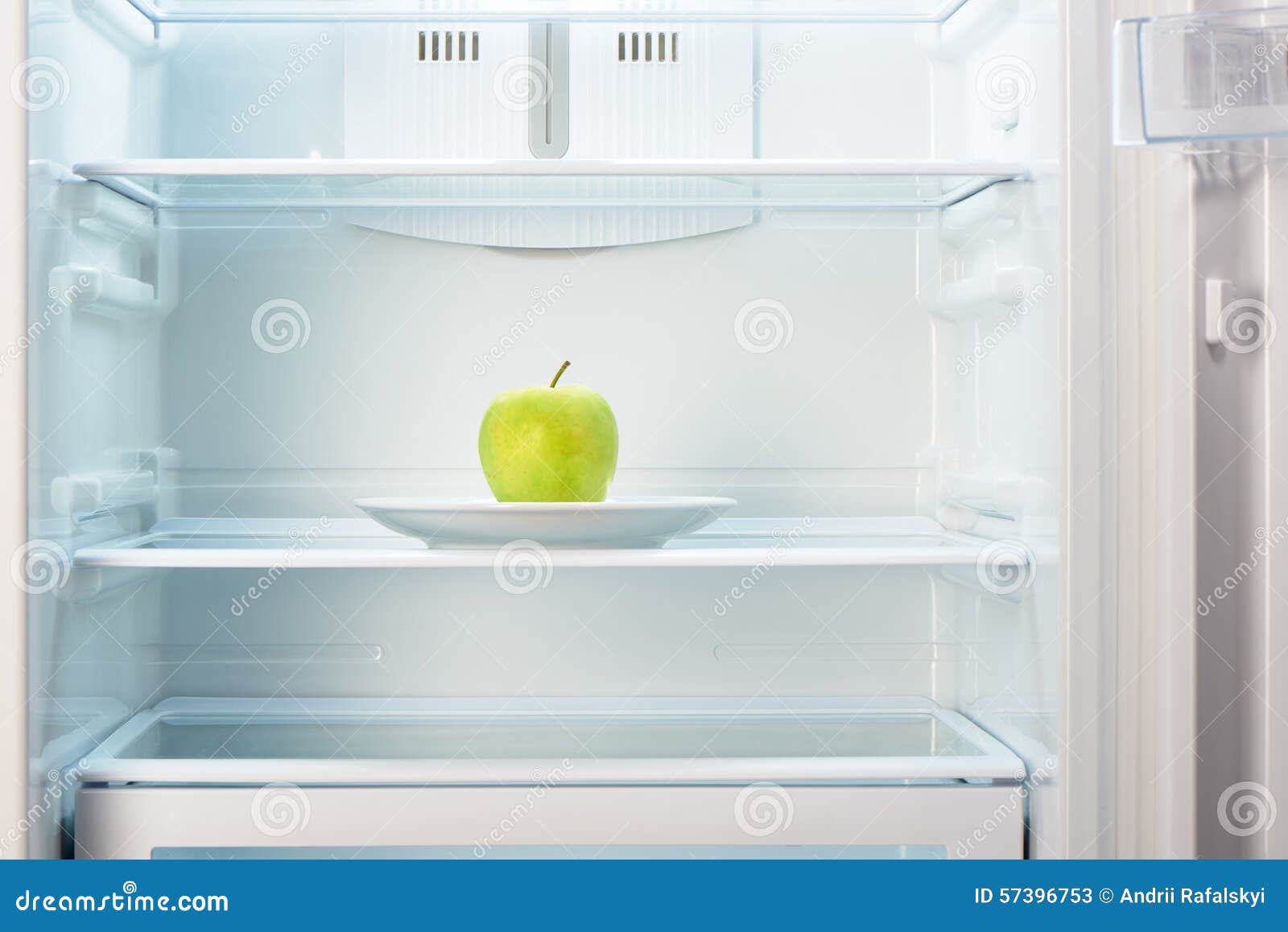 Green Apple on White Plate in Open Empty Refrigerator Stock Image ...
