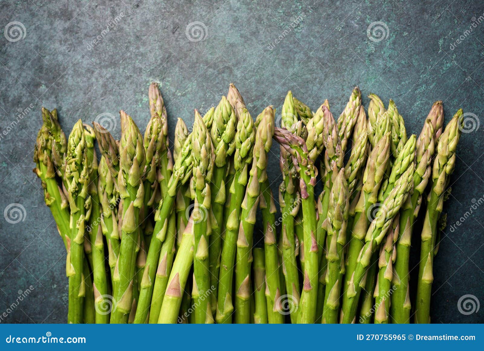 Green asparagus on a table stock image. Image of gourmet - 270755965