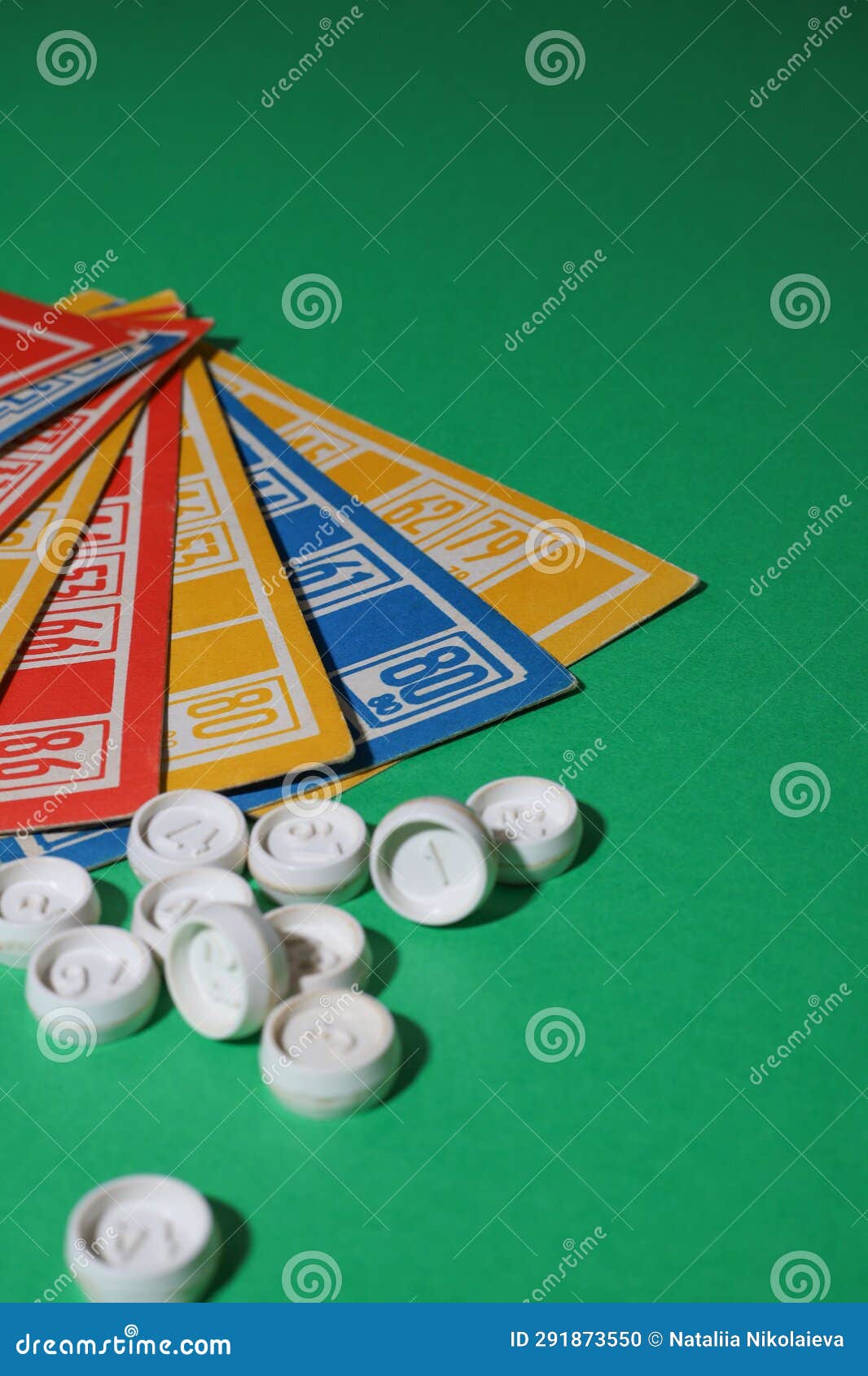 On a Green Background, Multi-colored Cards from the Lotto Game with ...