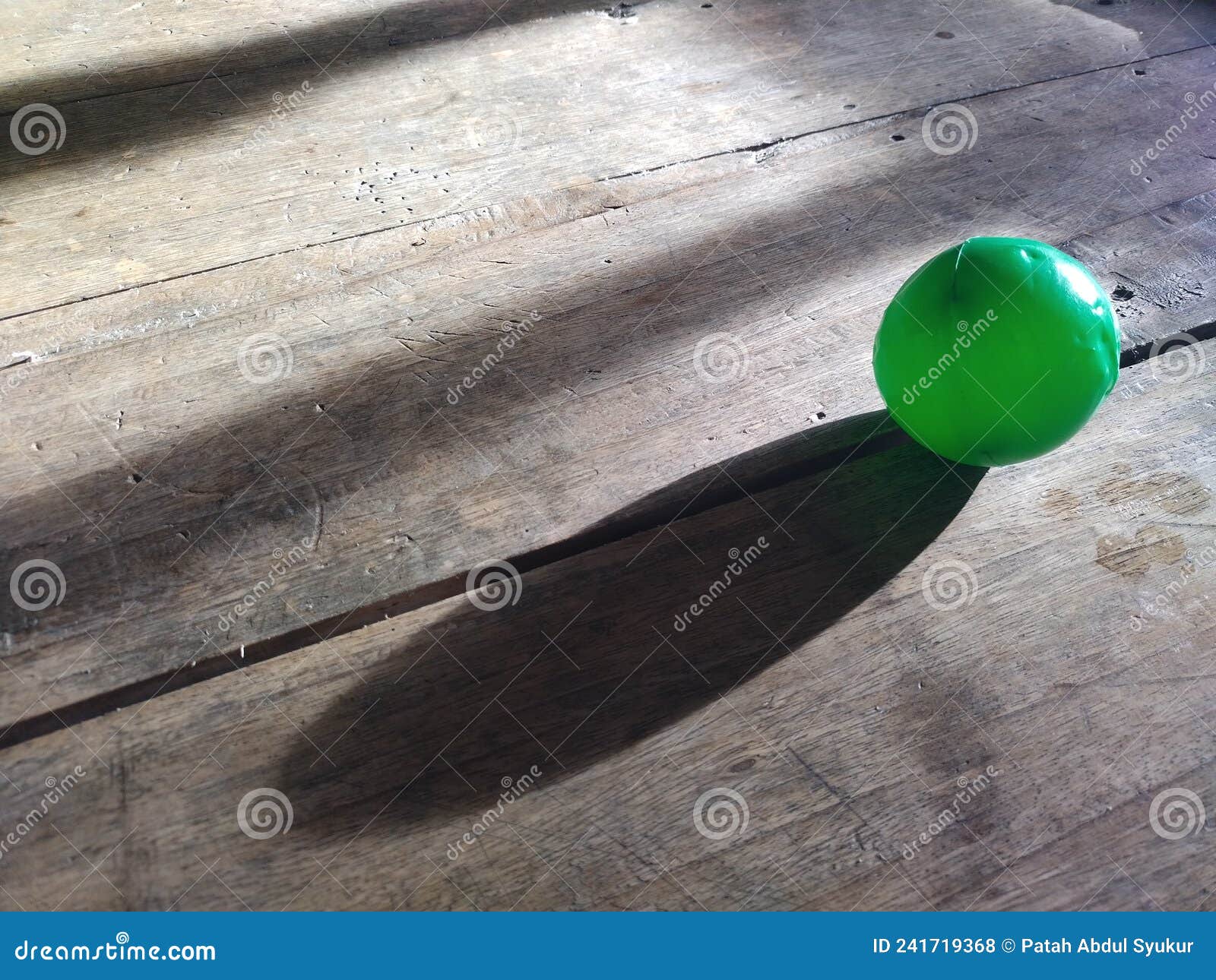 Green Ball and Shadow stock photo. Image of lighting - 241719368