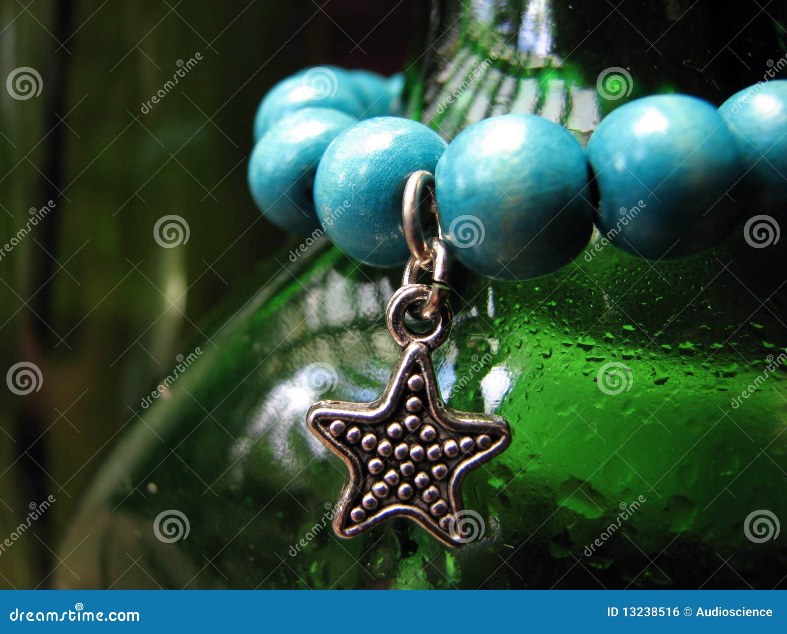 Green Beads with Metallic Star Stock Photo - Image of cultural ...