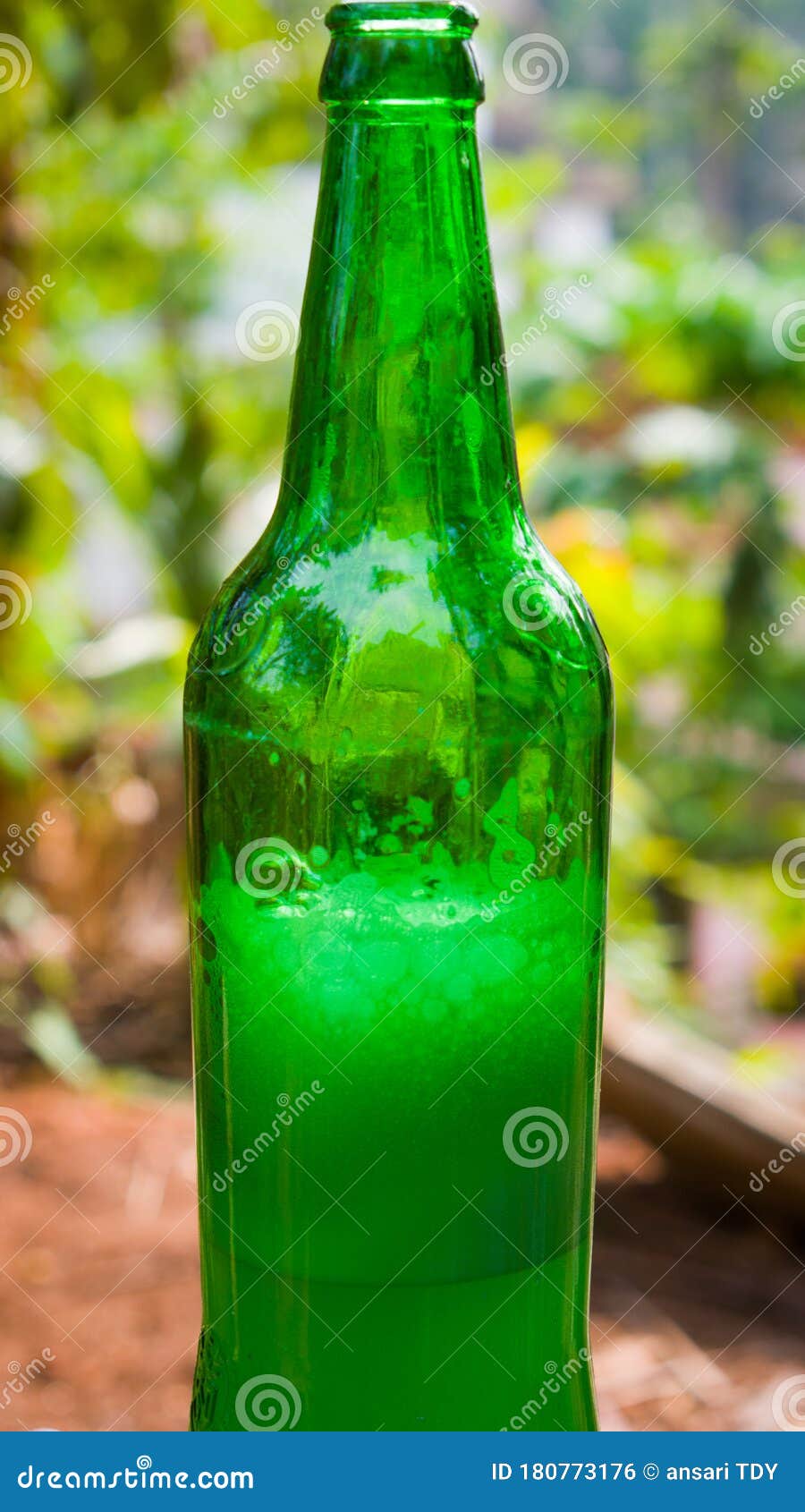 Green Beer bottle stock photo. Image of beverage, drink - 180773176