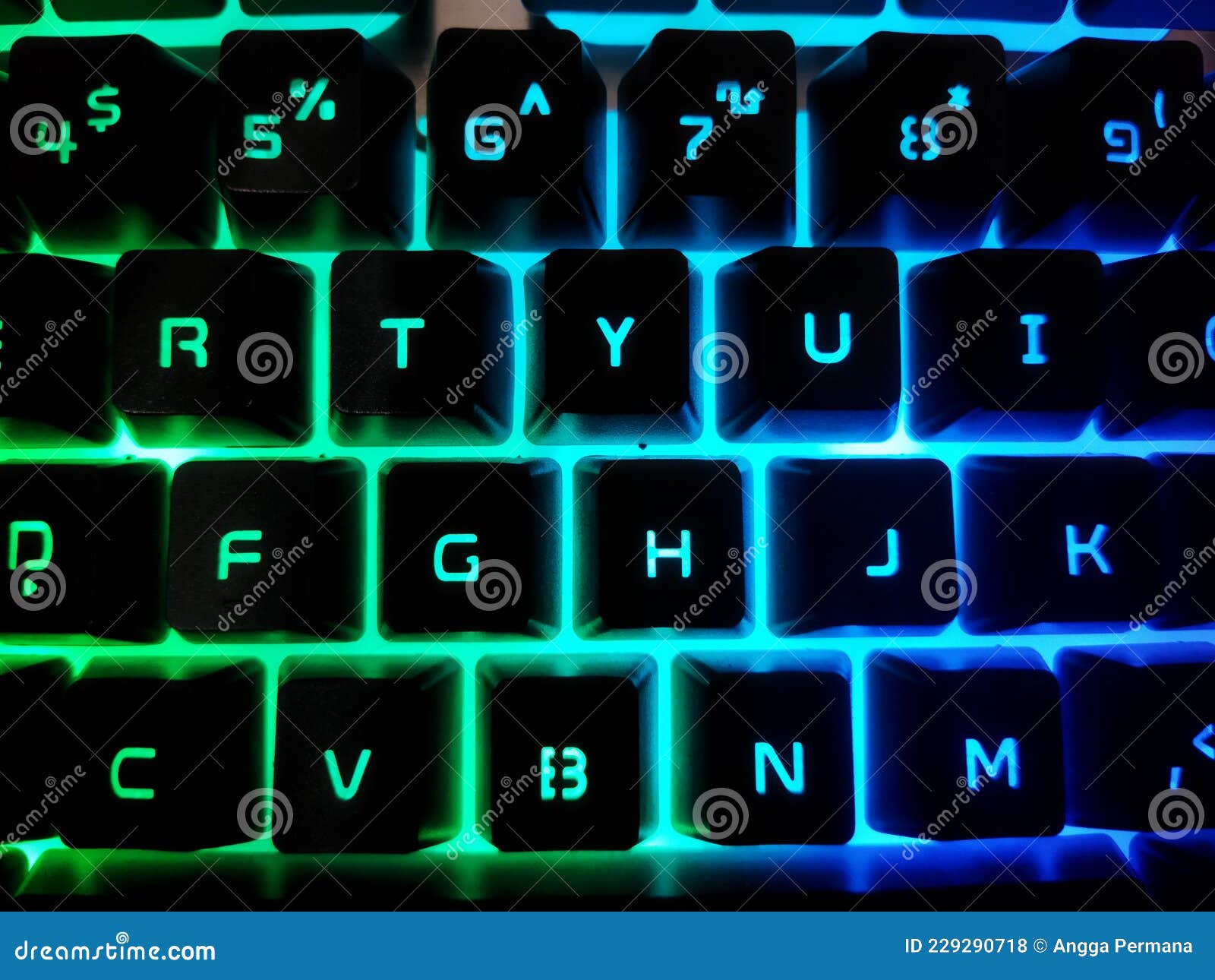 A Green and Blue Light on My Keyboard Stock Photo - Image of keyboard ...