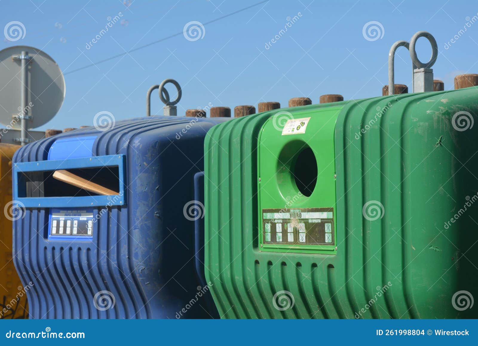 Green and Blue Plastic Containers for Garbage Sorting in the Street ...