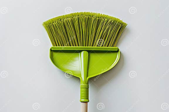 A Green Broom and a Green Brush on a White Surface Stock Image - Image ...